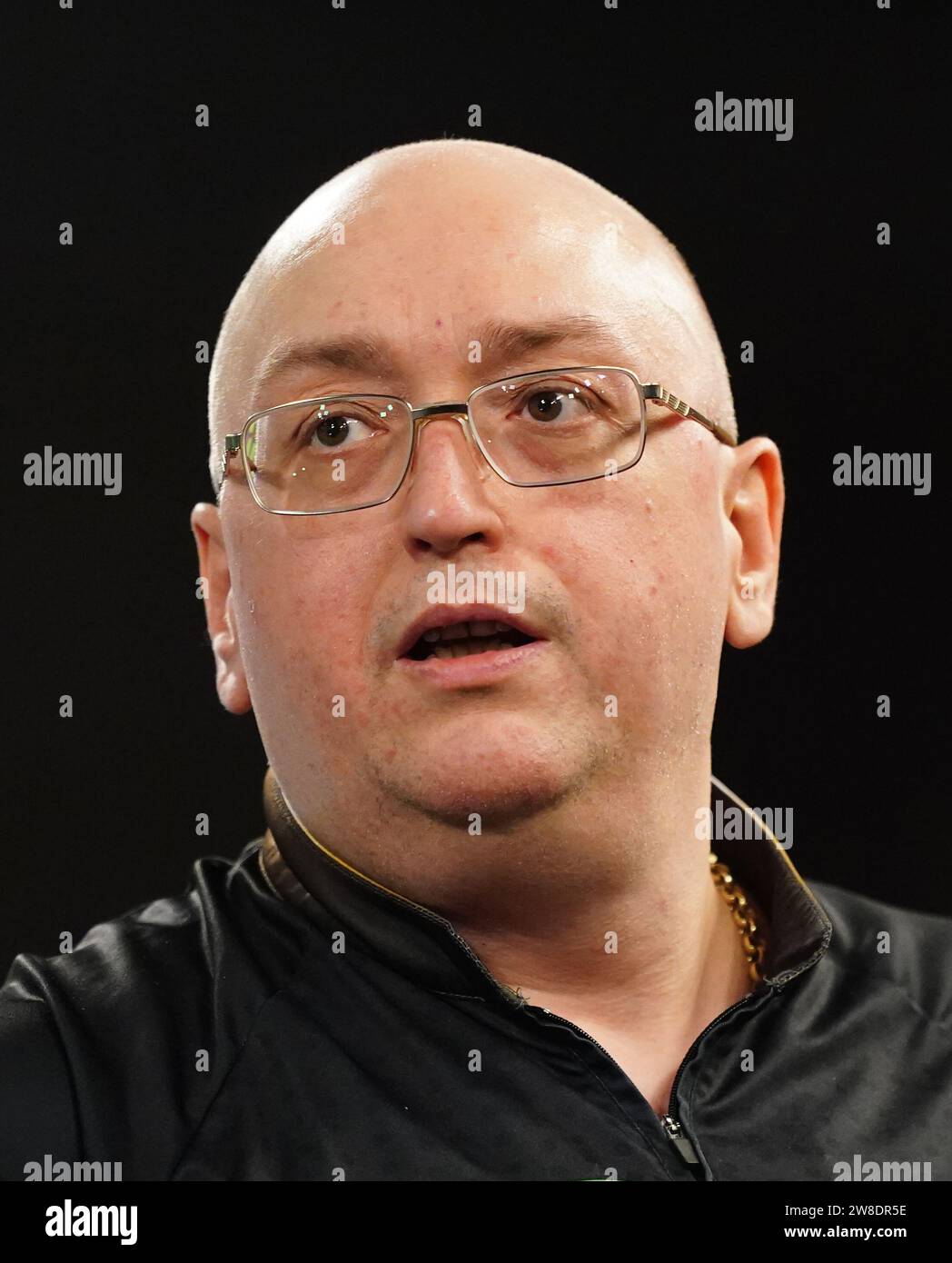 Andrew Gilding in action against Luke Littler (not pictured) on day ...