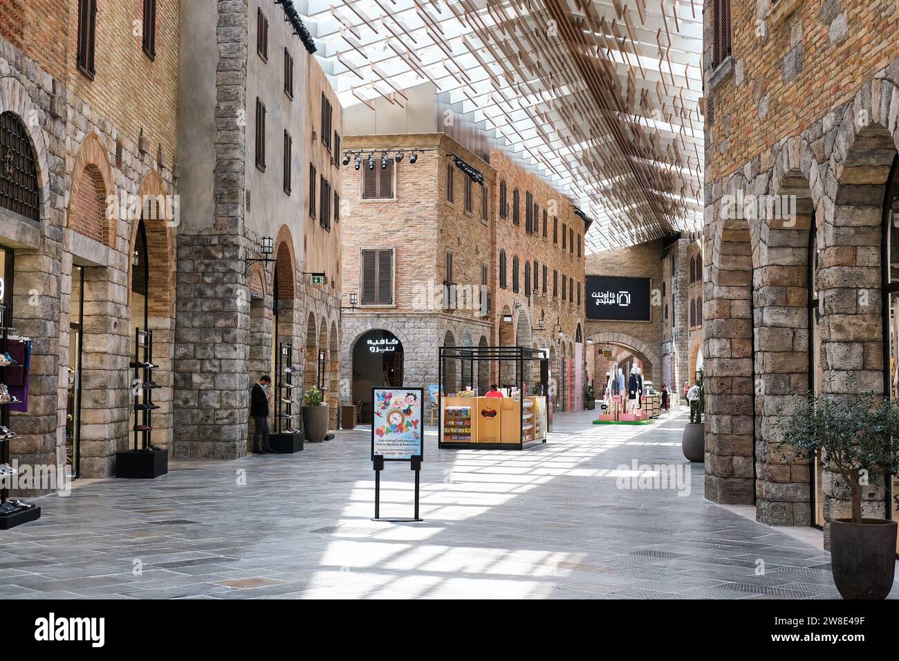 The interior of the Italian style Outlet Village shopping mall in Dubai ...