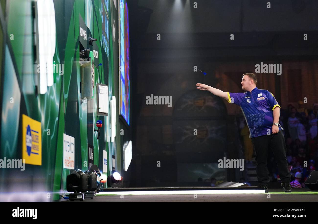 Luke Littler in action against Andrew Gilding (not pictured) on day ...
