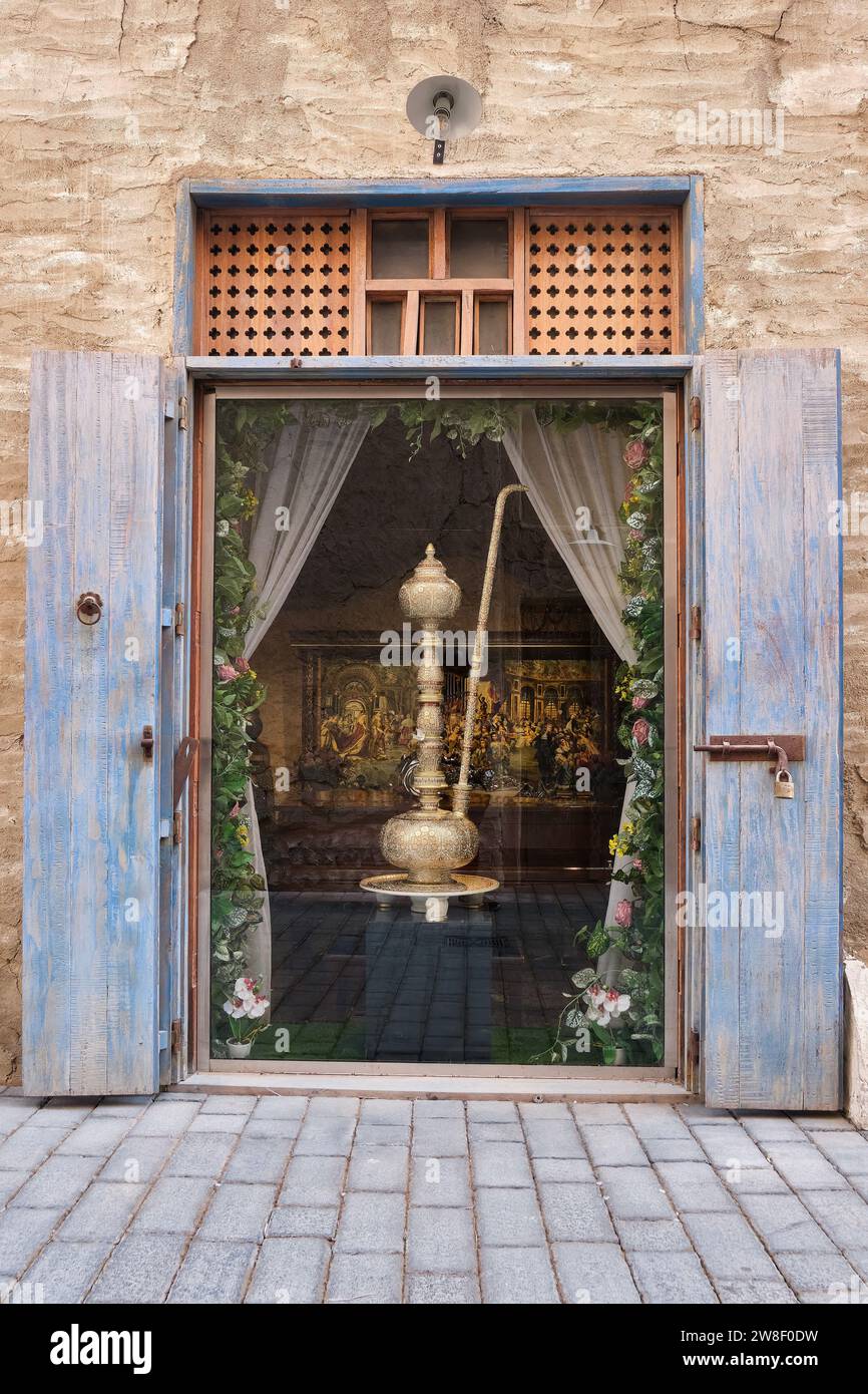 Stylish shop with a giant brass Indian teapot ornament in the Al Fahidi ...
