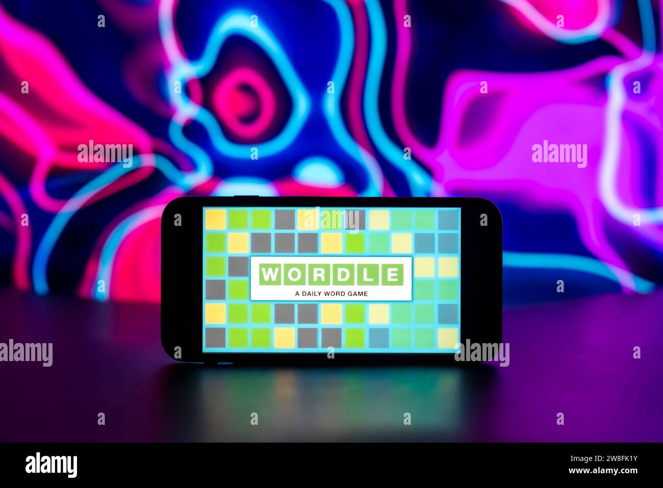 In this photo illustration, the Wordle logo is seen displayed on a ...