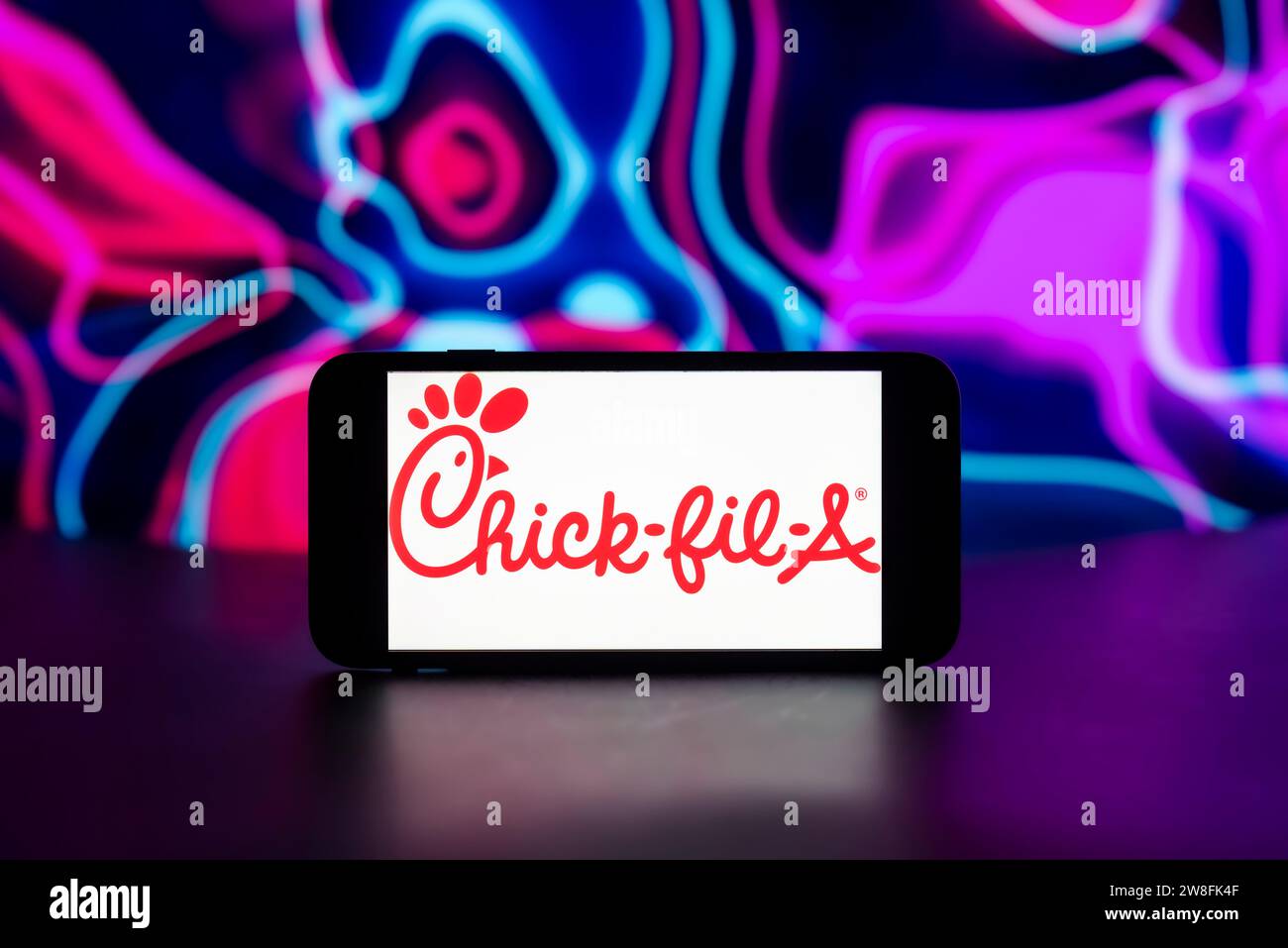 In this photo illustration, the Chick-fil-A logo is seen displayed on a ...