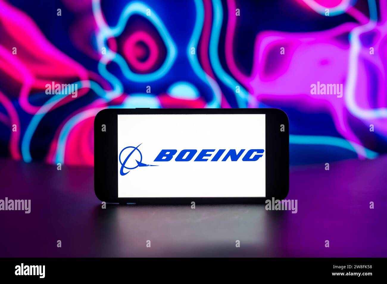 In this photo illustration, the Boeing logo is seen displayed on a ...
