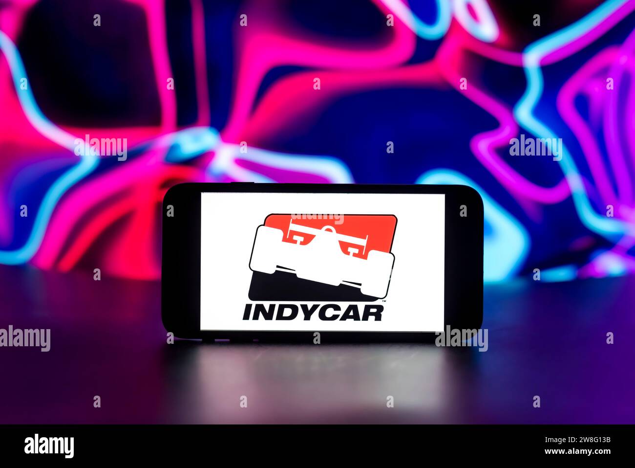 In this photo illustration, the Indycar logo is seen displayed on a ...