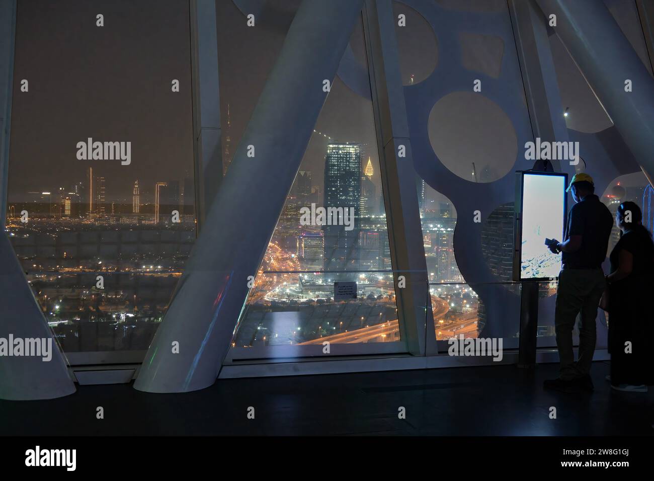 Panoramic night time Dubai city skyline view from the Dubai Frame ...