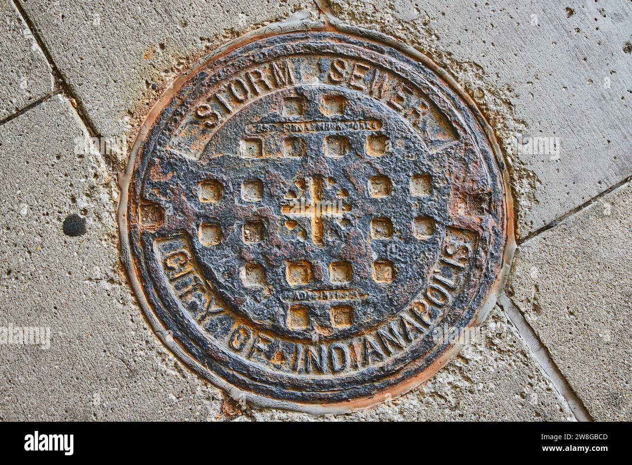Rusty Storm Sewer Manhole Cover Indianapolis Stock Photo - Alamy
