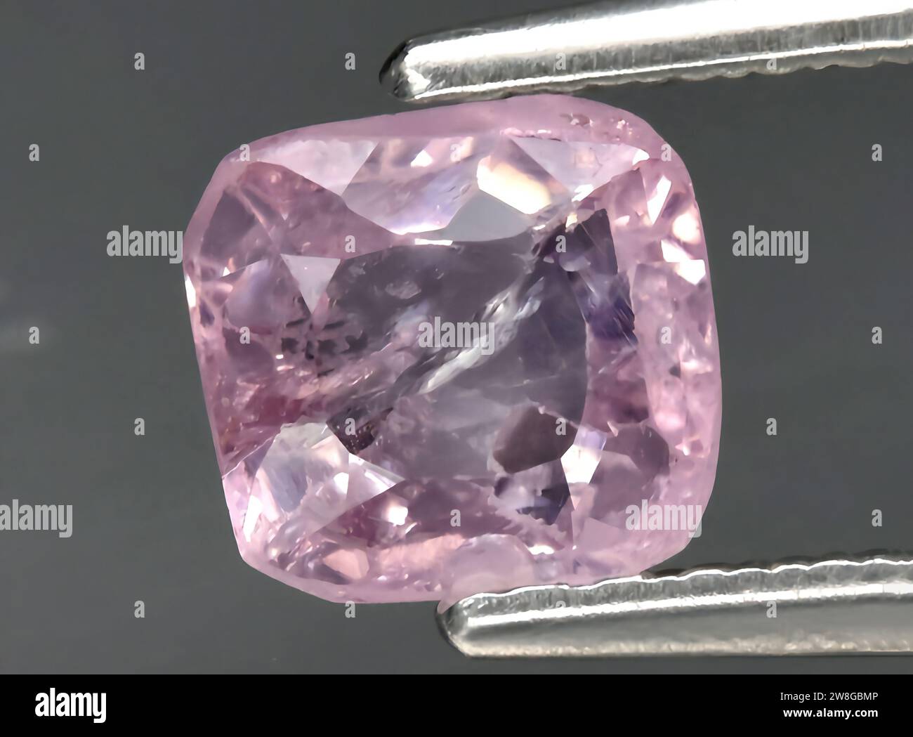 natural pink spinel gem on background Stock Photo - Alamy