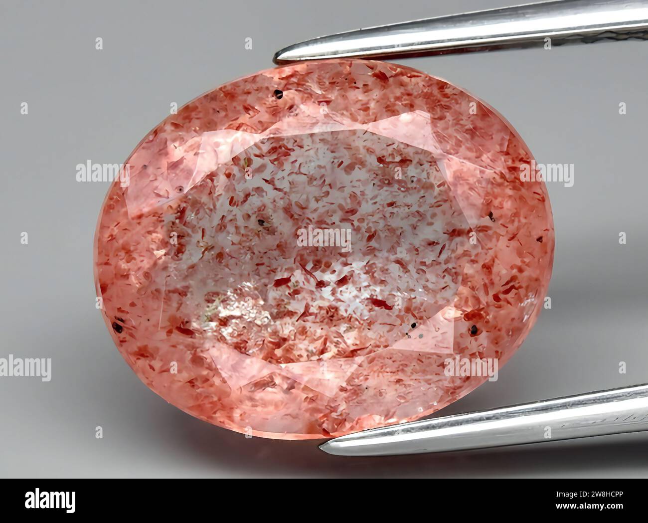 natural strawberry quartz gem on background Stock Photo - Alamy