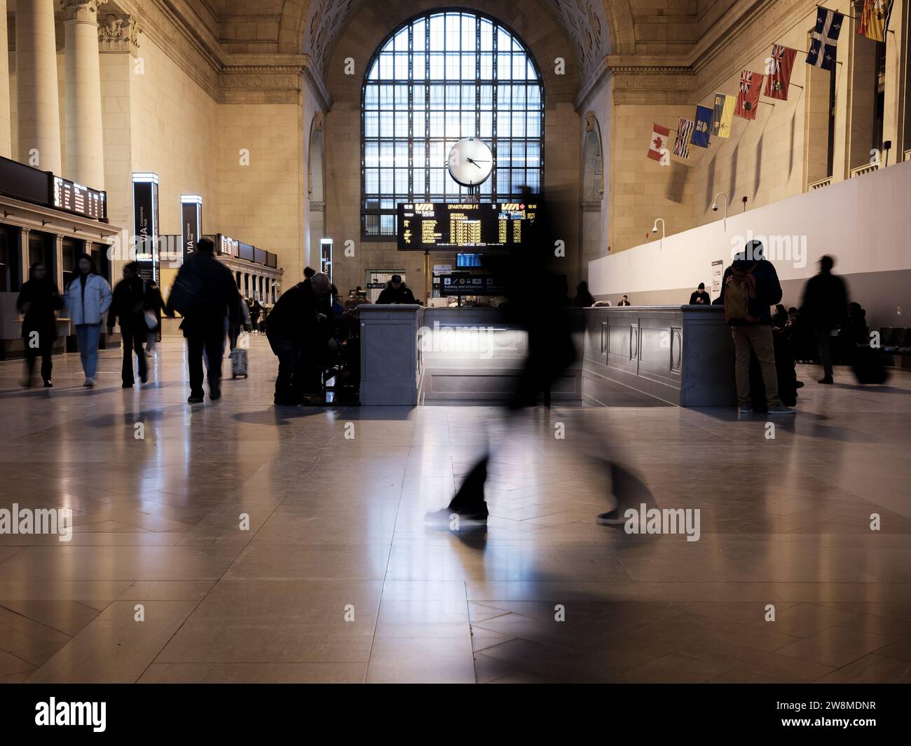 Commuters scramble to catch their train inside Union Station in Toronto ...