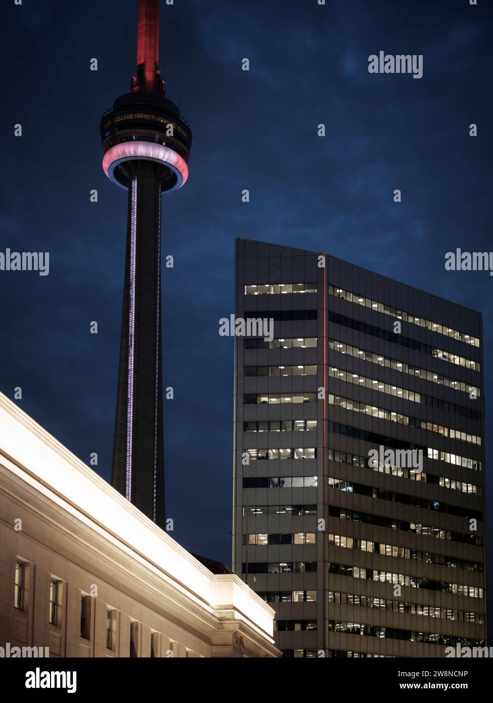 Toronto Canada's famous CN Tower lit up at night Stock Photo - Alamy