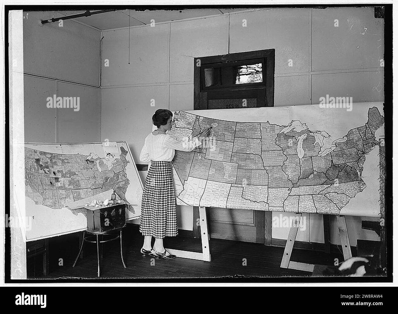 Woman creating map of United States showing states and counties), 8-12 ...