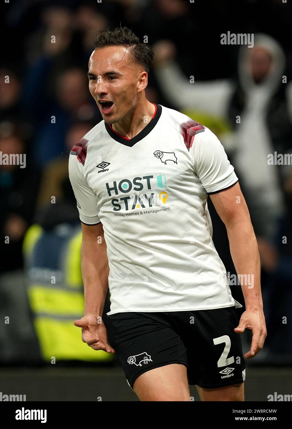 Derby County's Kane Wilson celebrates scoring their side's second goal ...