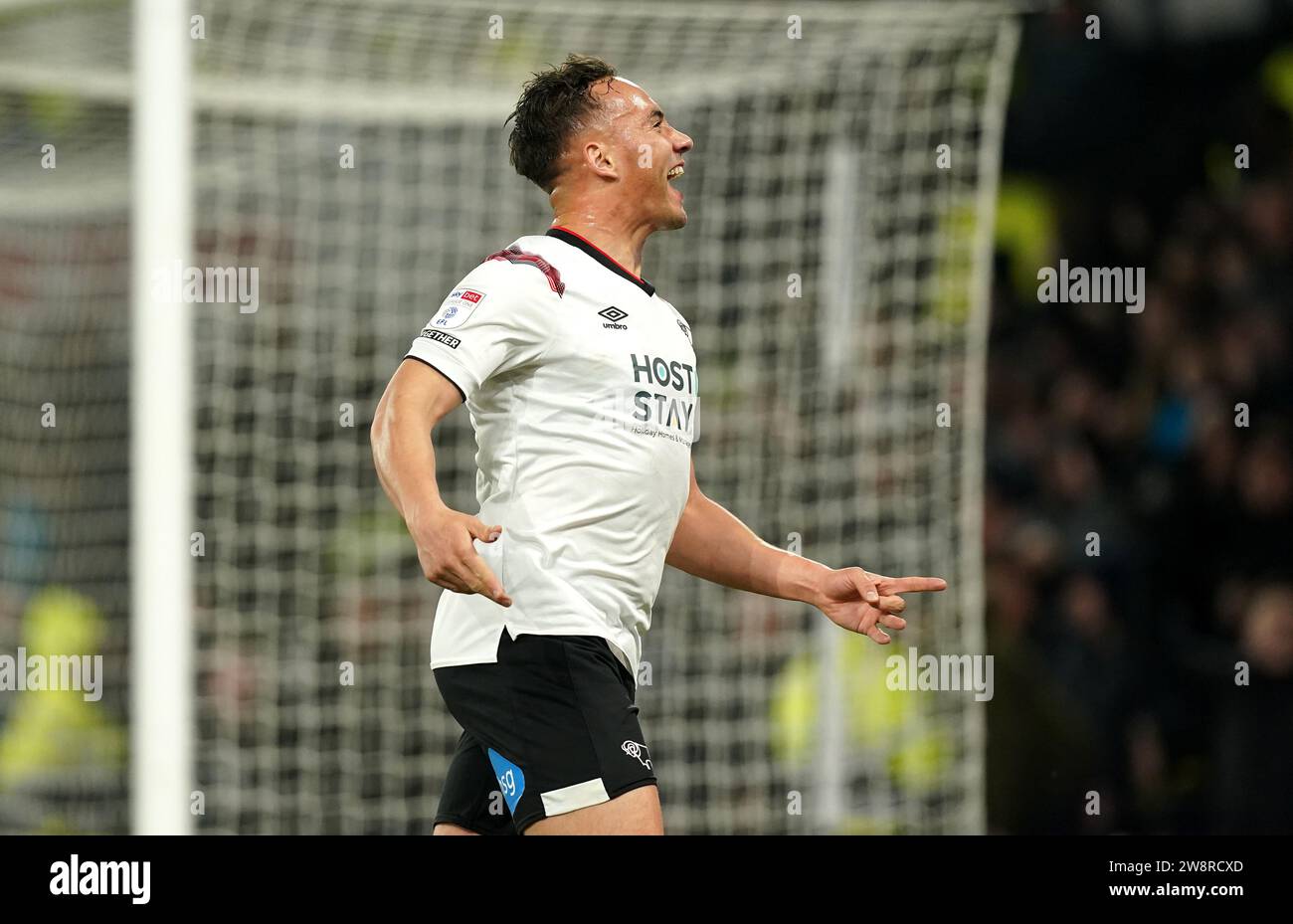 Derby County's Kane Wilson celebrates scoring their side's second goal ...