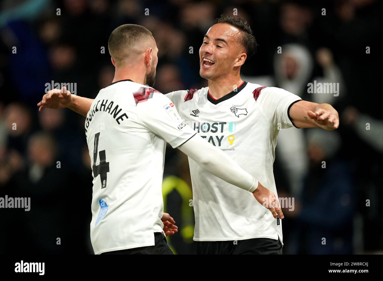 Derby County's Kane Wilson celebrates scoring their side's second goal ...