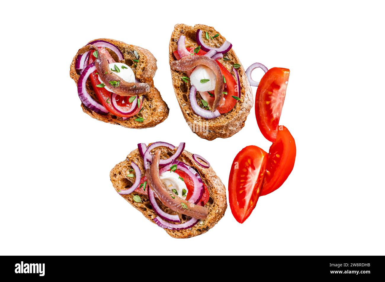 Spanish tapas on bread with olive oil, herbs, tomatoes and spicy ...