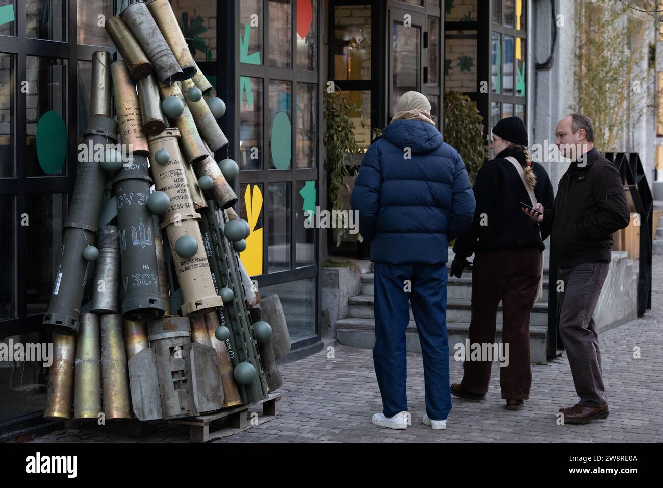 Kyiv, Ukraine. 20th Dec, 2023. People stand next to a symbolic ...