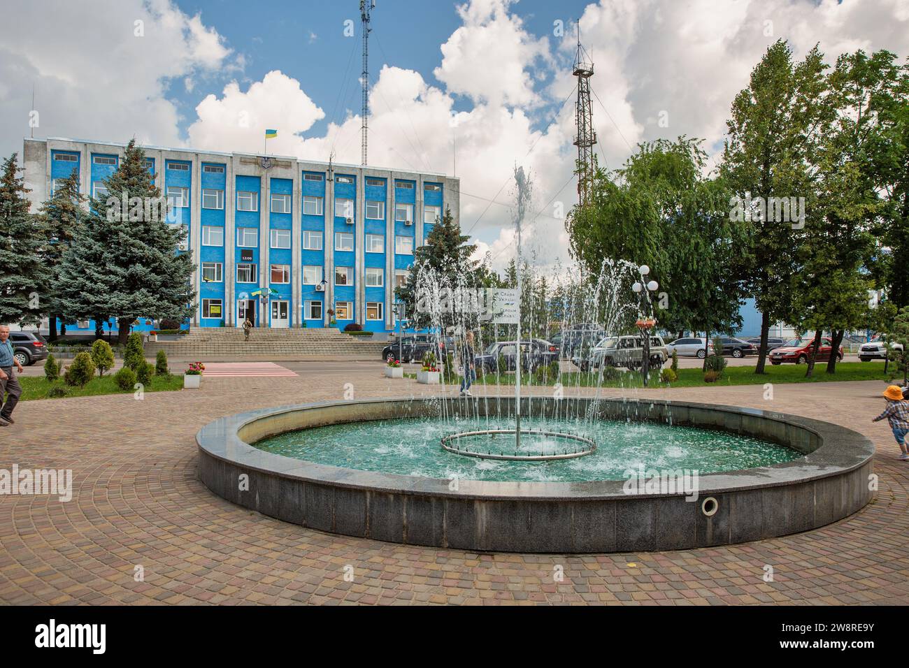 Sarny, Ukraine - June 30, 2023: People visit park with fountain in ...