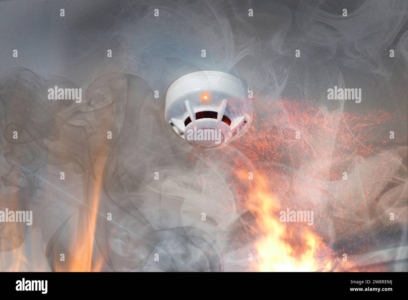 smoke detector in the ceiling, emergency fire alarm at an apartment's ...