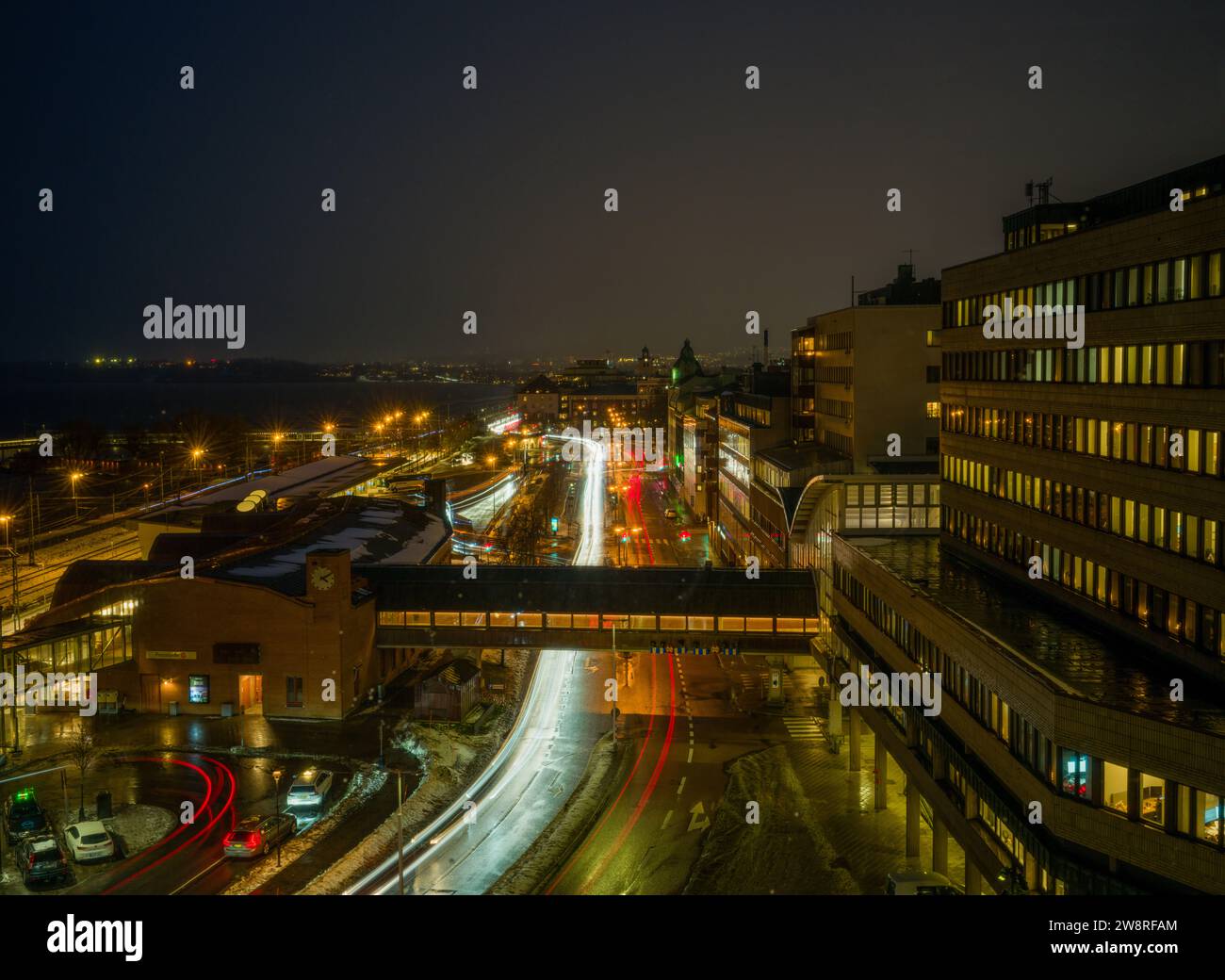 Downtown Jonkoping with traffic at night Stock Photo - Alamy
