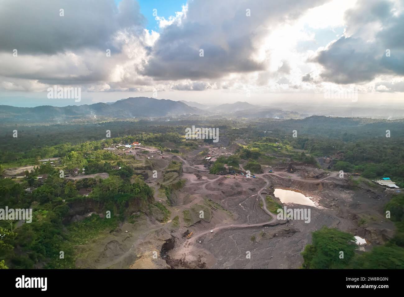 A beautiful valley under an active volcano. An old river made of ash ...