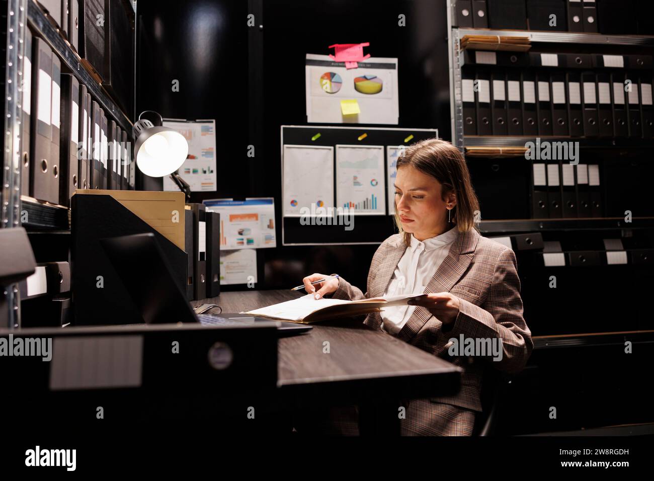 Private detective holding investigations files, analyzing crime scene ...