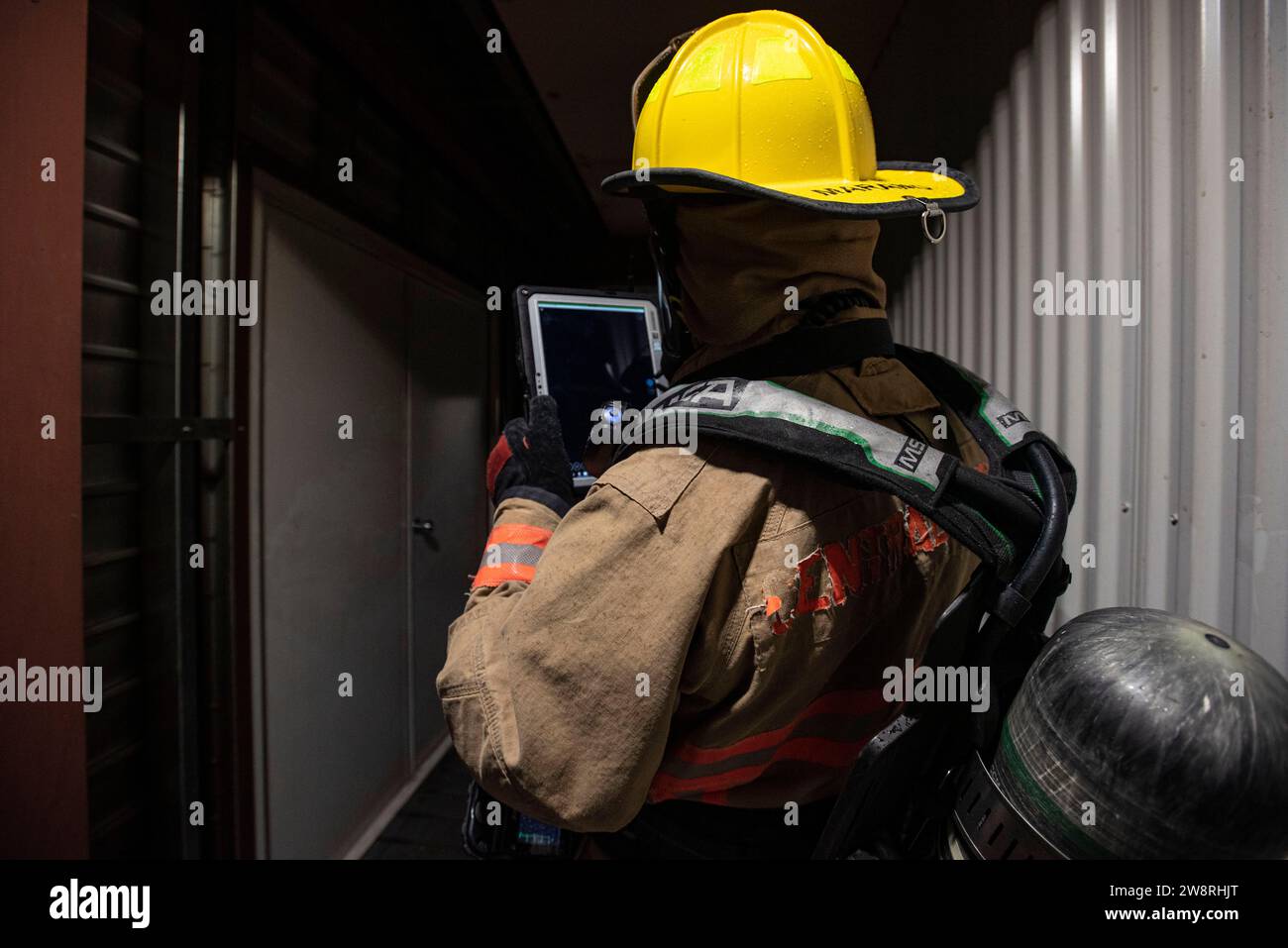 A firefighter from the Central Mat-Su Fire Department Station 61, in ...