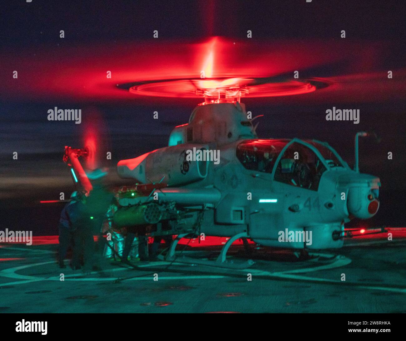 U.S. Sailors assigned to the amphibious dock landing ship USS Harpers ...