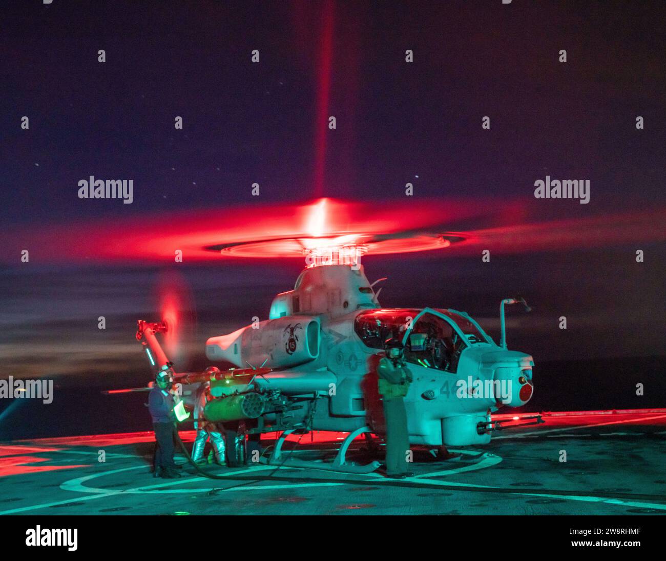 U.S. Sailors assigned to the amphibious dock landing ship USS Harpers ...