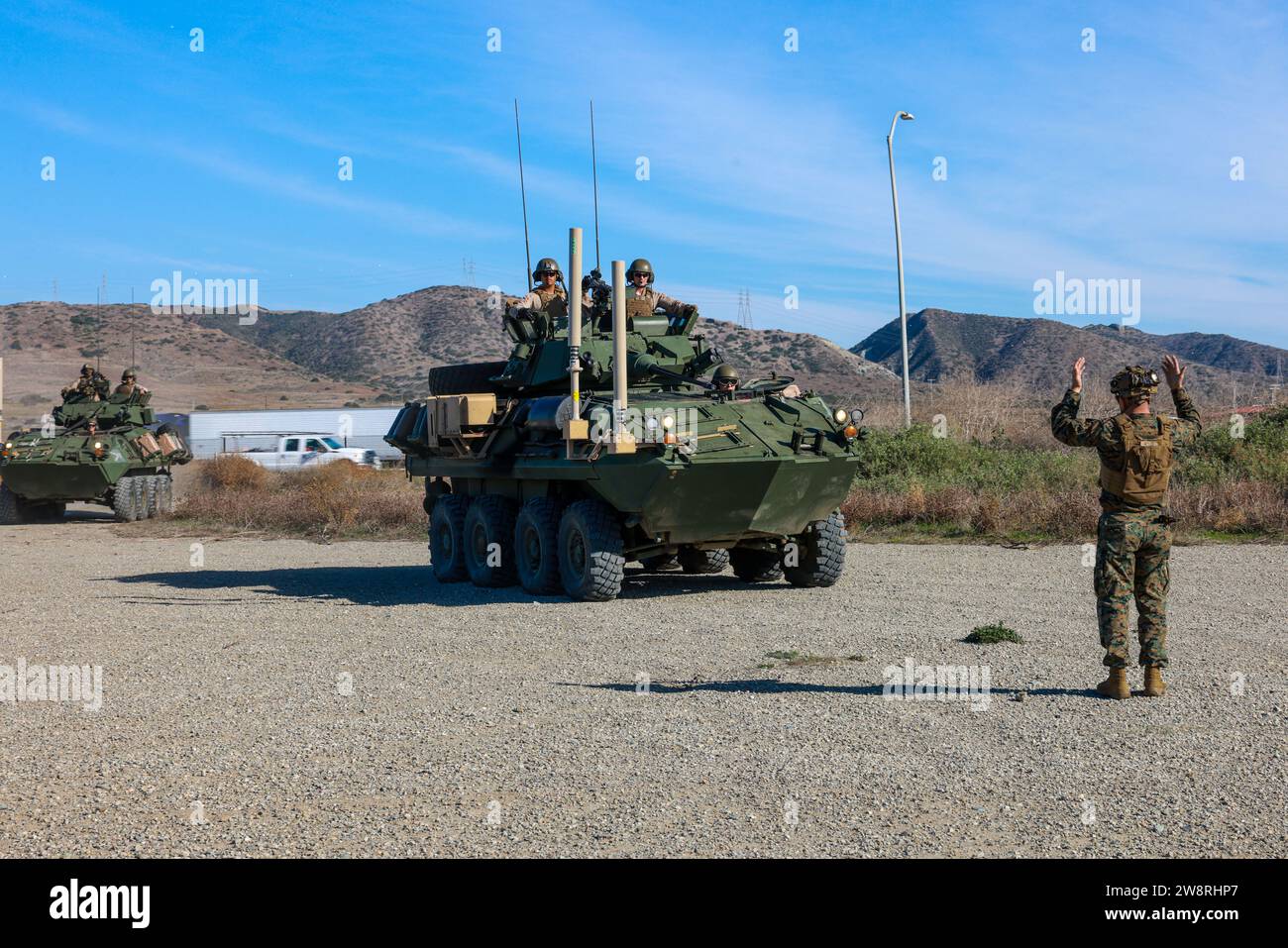 U.S. Marine Corps Capt. James Myles, right, the company commander for ...