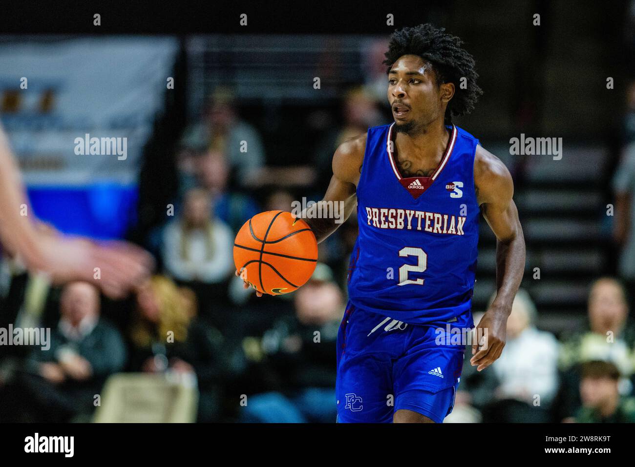 Winston-Salem, NC, USA. 21st Dec, 2023. Presbyterian Blue Hose guard ...