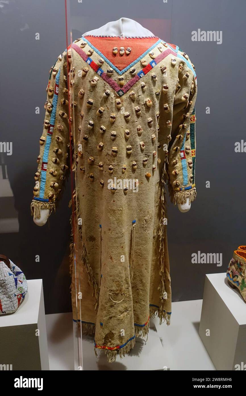 Woman's dress, Crow, c. 1885, elk teeth, bone, glass beads, hide Stock ...