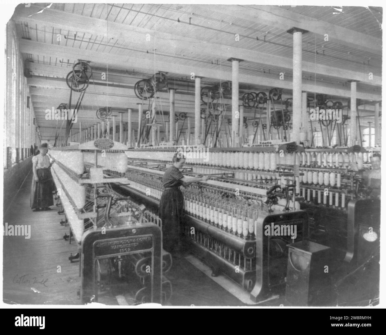 Women and machinery in New England cotton mill, ca. 1900 Stock Photo ...