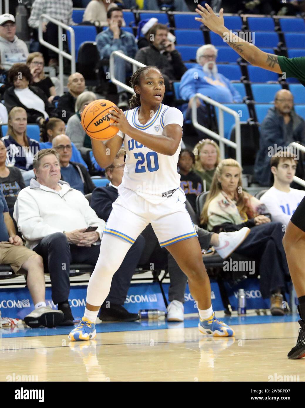 December 21, 2023 - UCLA Bruins guard Charisma Osborne #20 looks to ...