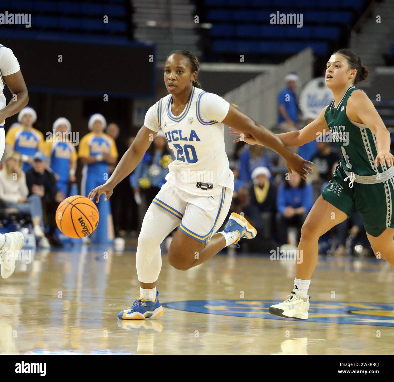December 21, 2023 - UCLA Bruins guard Charisma Osborne #20 dribbles ...