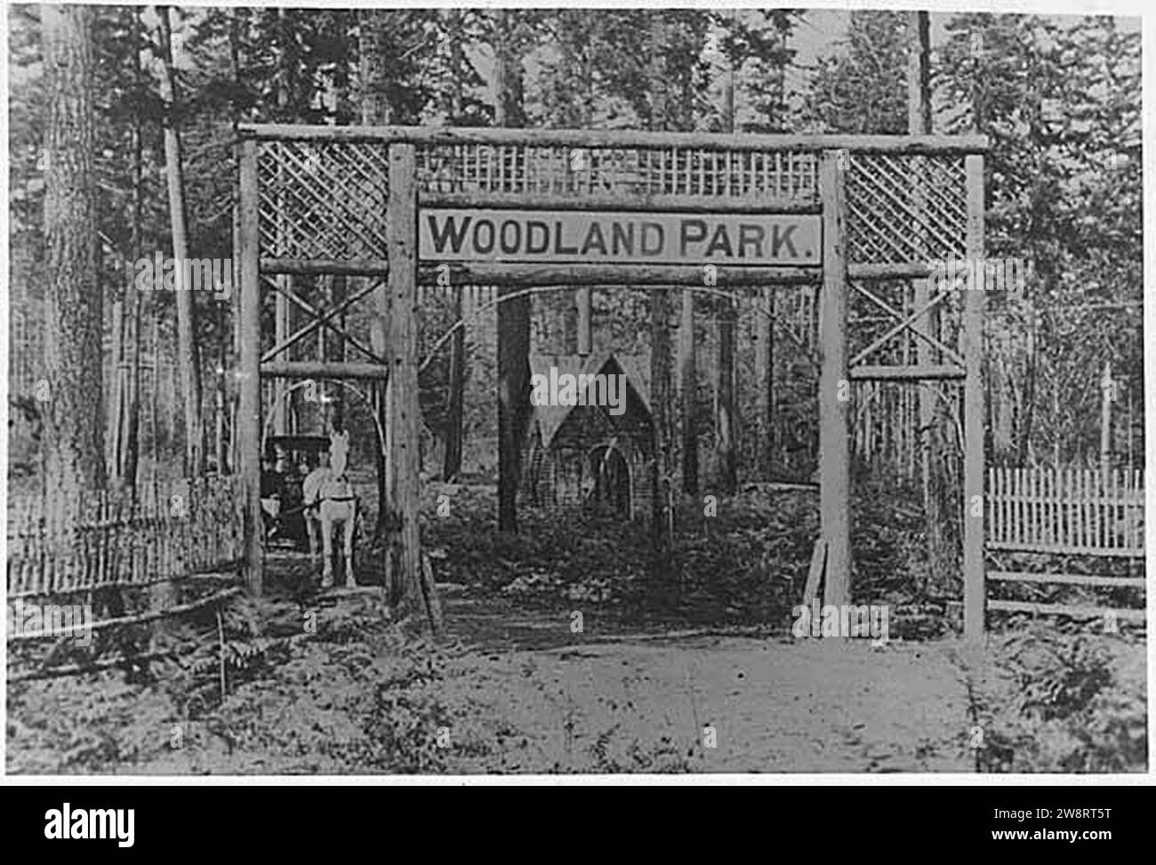 Woodland Park wooden entrance gate and fence, Seattle, probably between ...
