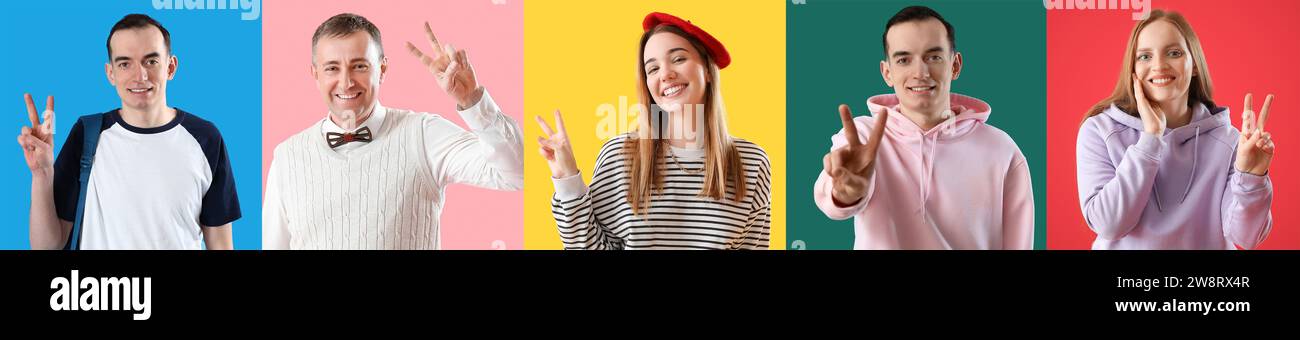 Group of people showing victory gesture on color background Stock Photo ...