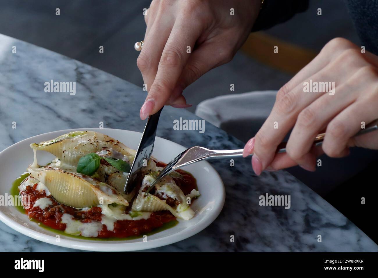 italian food shell pasta (conchiglie) dish stuffed with beef in close ...