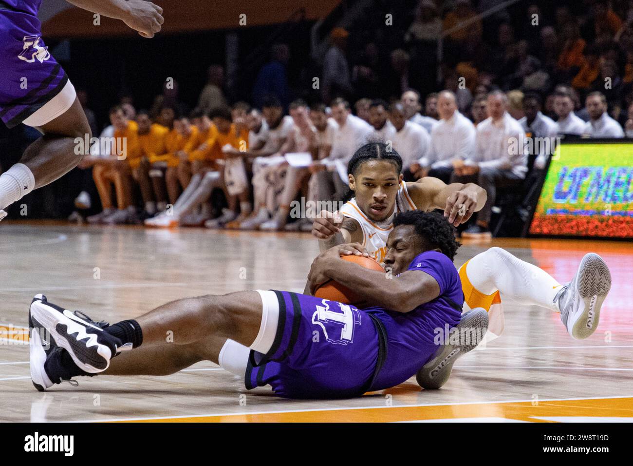 Tennessee guard Zakai Zeigler, rear, and Tarleton State guard Lue ...