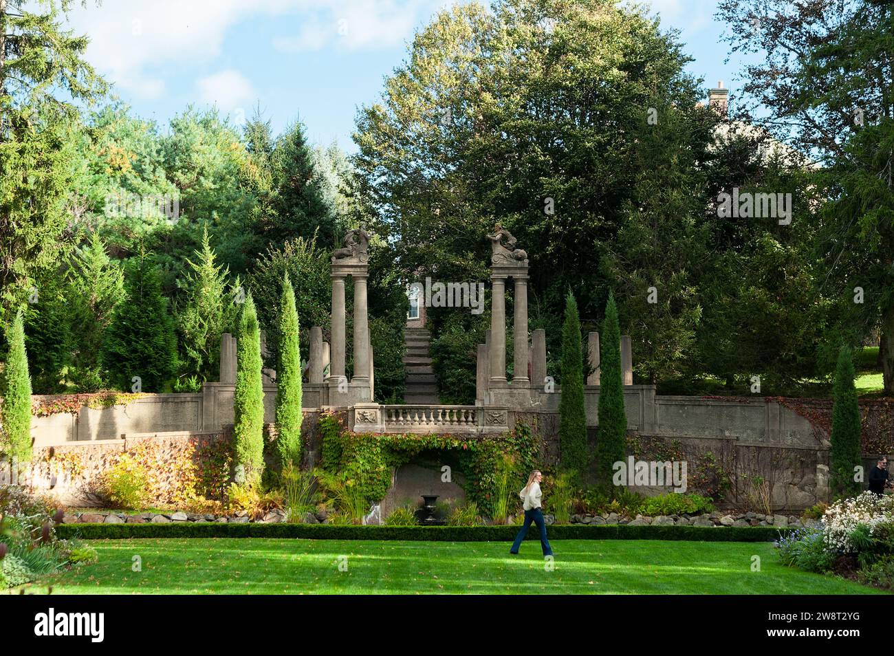 The Crane Estate - Ipswich, Massachusetts. A female tourist strolls ...