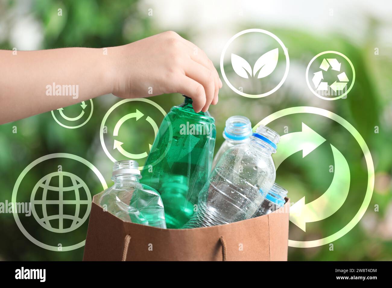 Woman paper bag full of garbage on blurred background, closeup ...