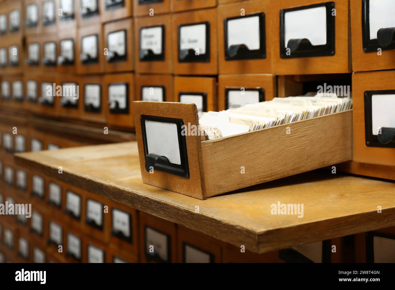 Closeup view of library card catalog drawers Stock Photo - Alamy