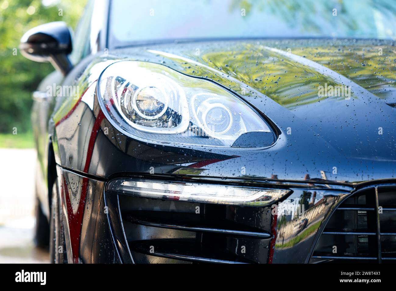 Clean auto after washing at outdoor car wash, closeup Stock Photo - Alamy
