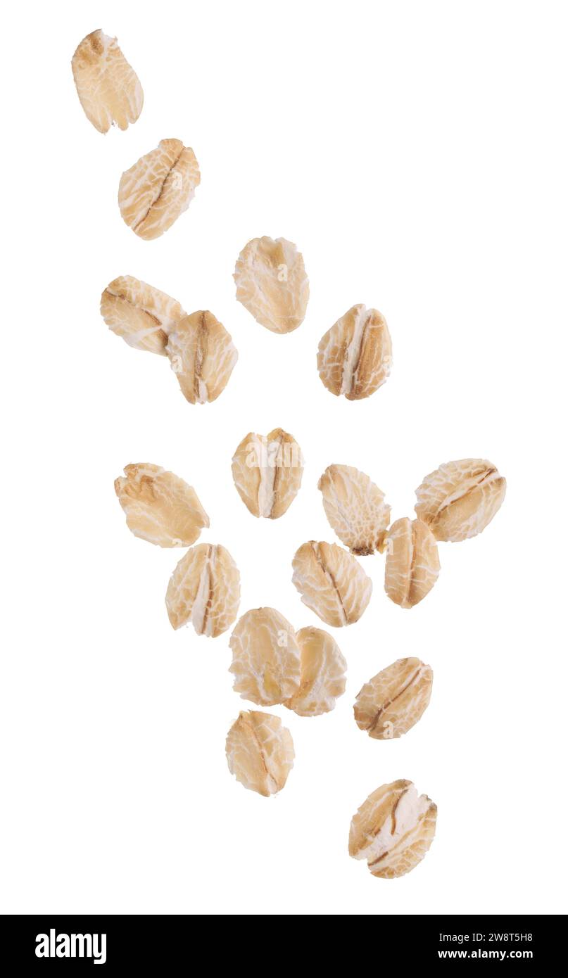 Dry oat flakes falling on white background Stock Photo - Alamy