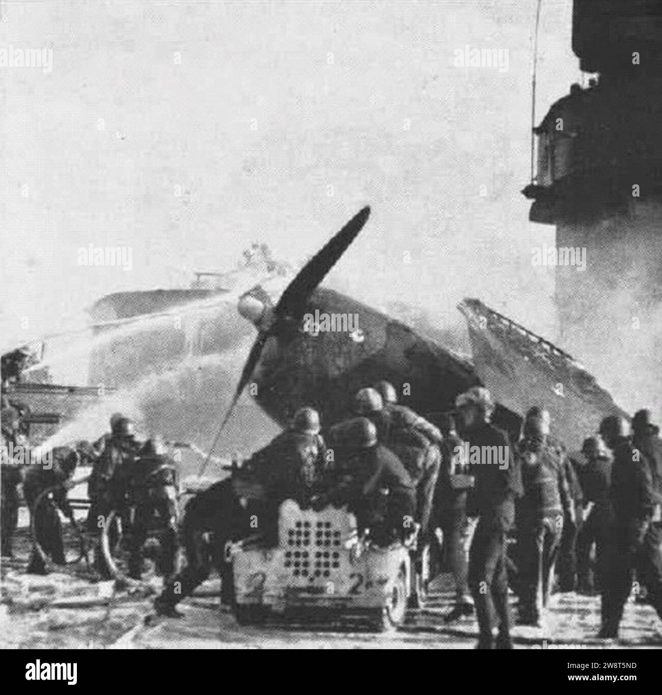 Wrecked F6F Hellcat on USS Enterprise (CV-6) on 14 May 1945 Stock Photo ...