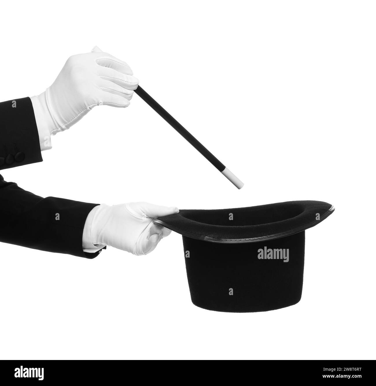 Magician showing magic trick with top hat on white background, closeup ...