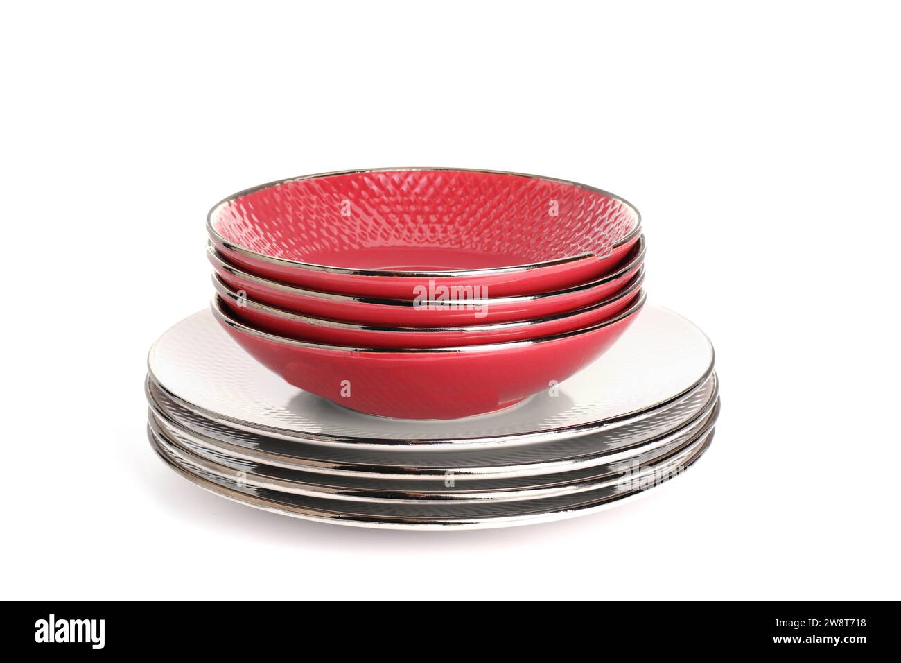 Stack of beautiful ceramic plates and bowls isolated on white Stock ...