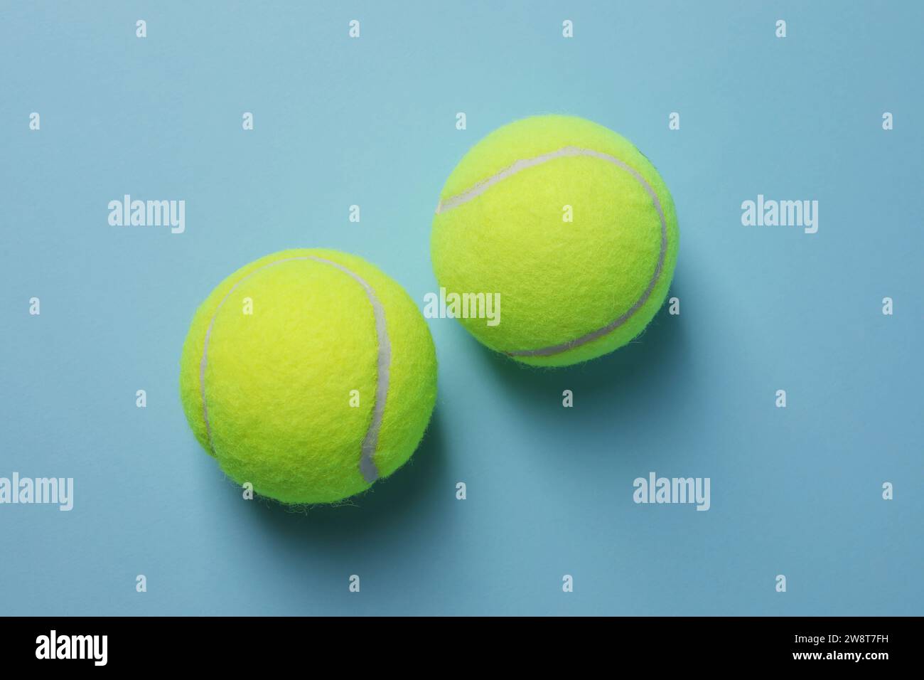Two tennis balls on hi-res stock photography and images - Alamy