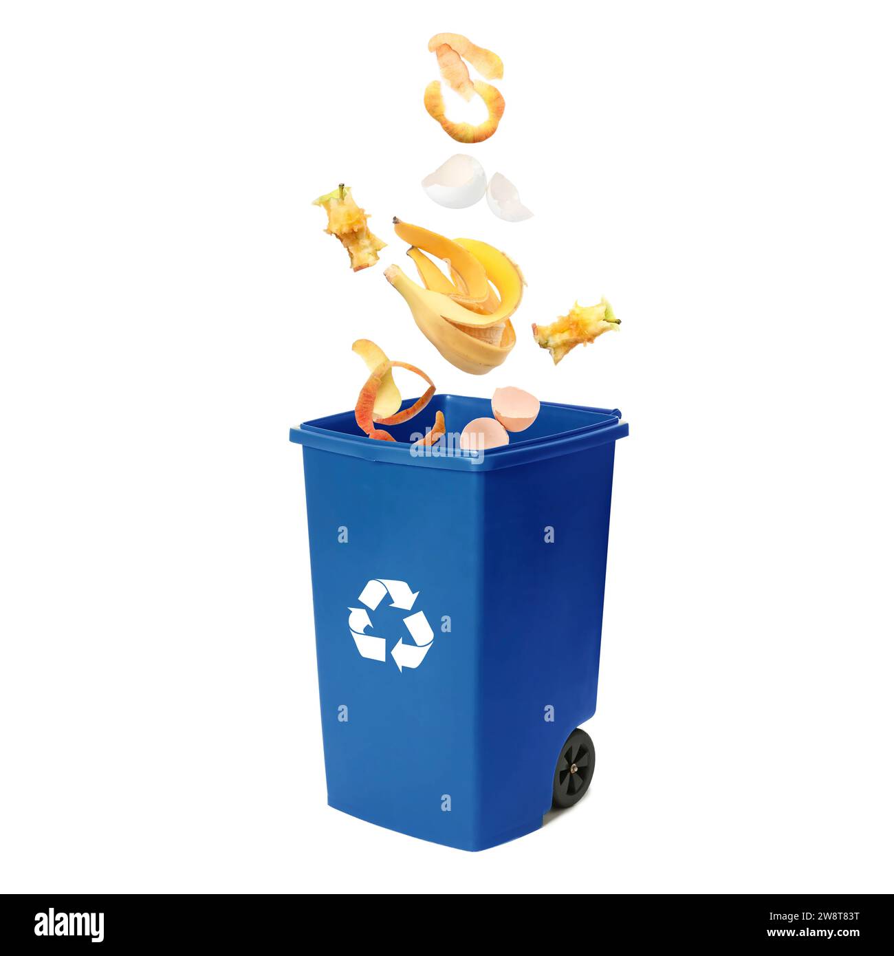 Garbage falling into trash bin on white background Stock Photo - Alamy