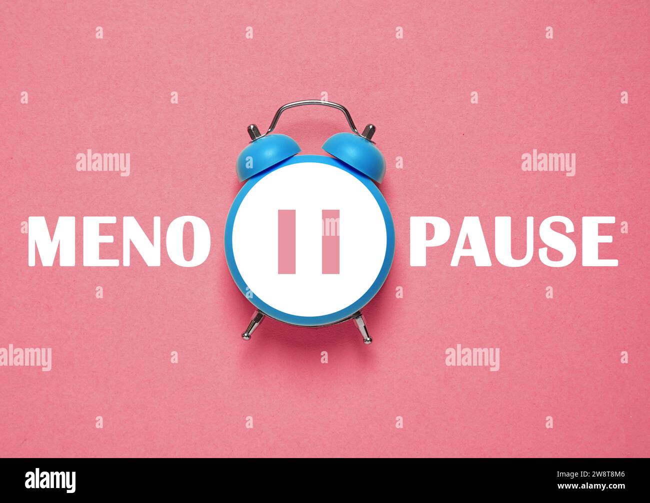 Menopause word and alarm clock with pause symbol on coral background ...