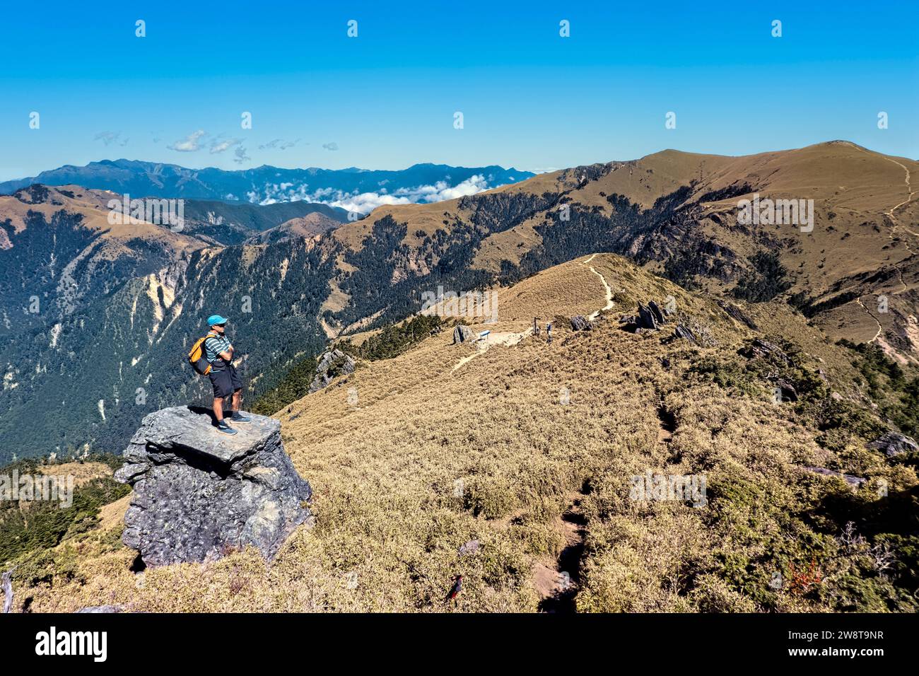 Hikers enjoying alpine panorama hi-res stock photography and images - Alamy